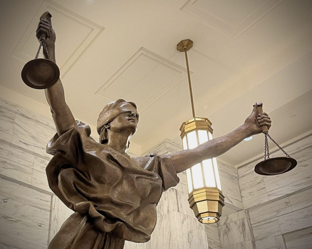 Blind Justice: Mark, John, Ginni, and Clarence - 3 Quarks Daily